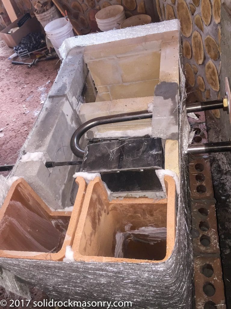 Wall Cabin Cookstove finished with brick | Solid Rock Masonry